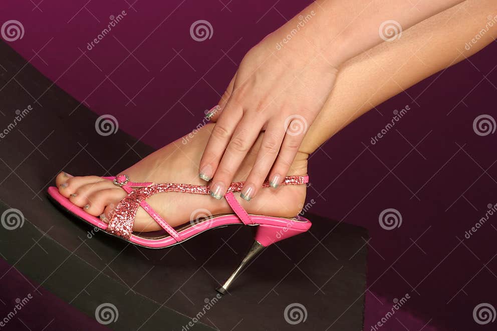 Foot in hand stock image. Image of backdrop, glamour, female - 405073