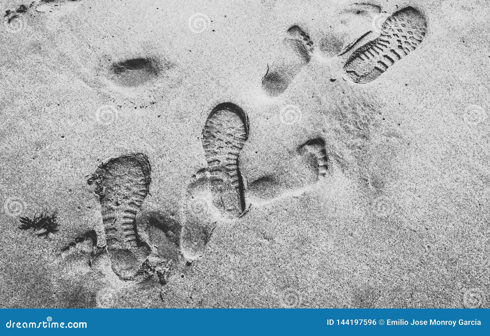 Foot marks in the sand stock photo. Image of sign, shoes - 144197596