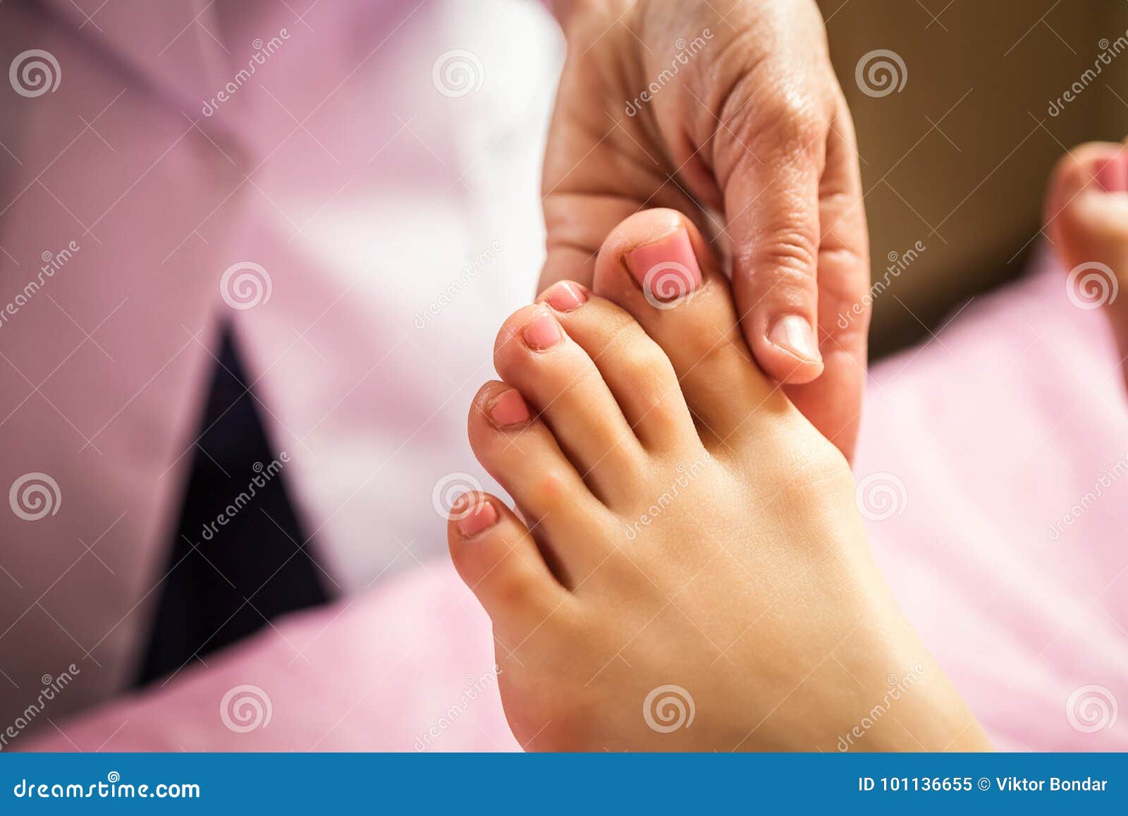 Foot Massage In Spa Salon Closeup Young Woman Having Feet Massage In