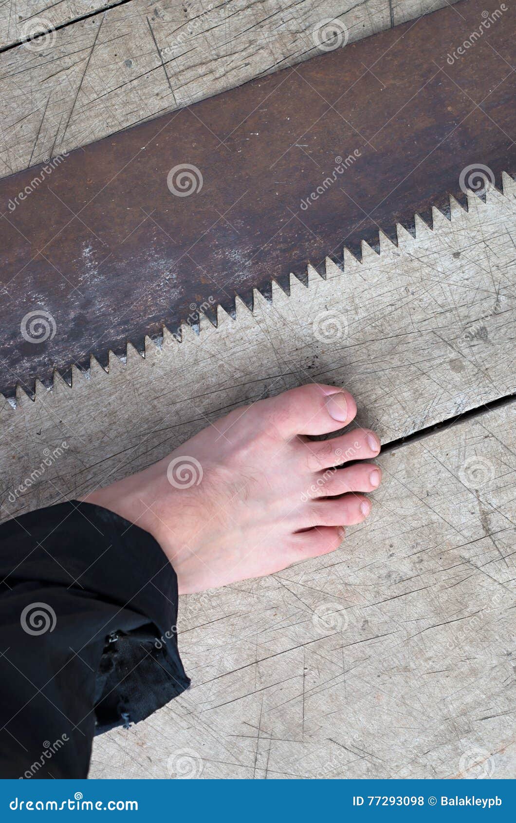 Foot and saw blade stock photo. Image of dirty, body - 77293098