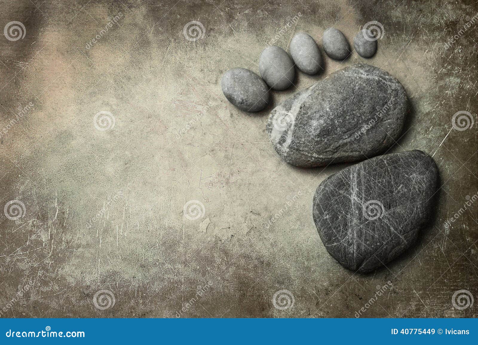A Foot Shape With Toes Made Out Of Rock Pebbles Sitting On A Boulder ...