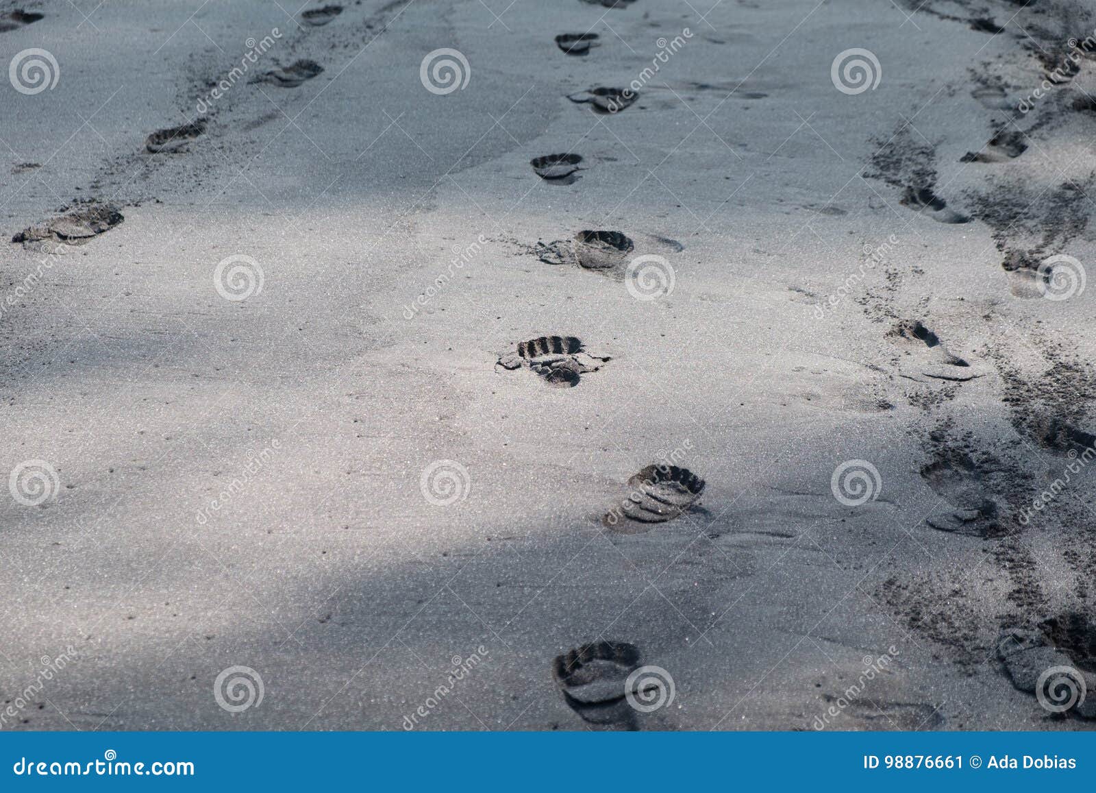 Foot steps in sand stock image. Image of destination - 98876661