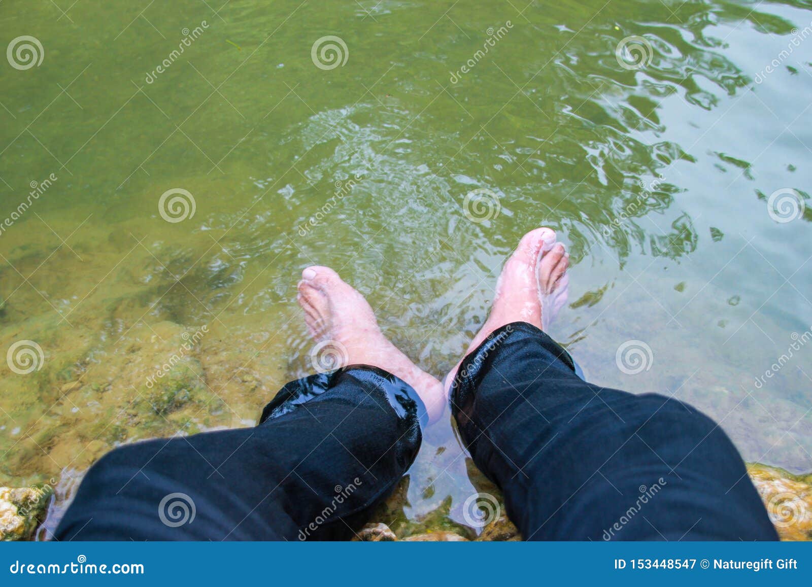 Image of the Two Feet Blocking the Waterfall Stock Image - Image of ...