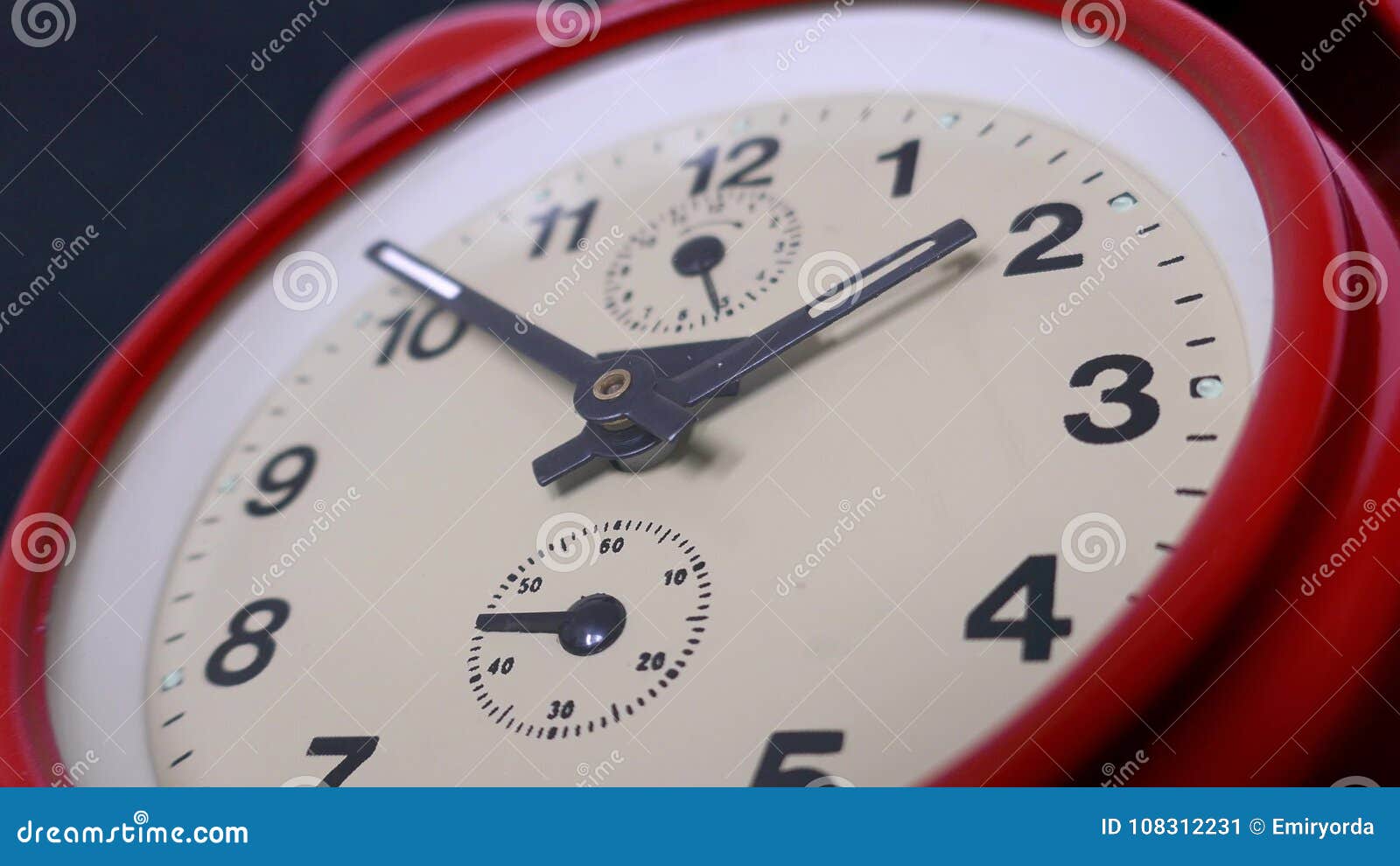 Footage of an Old Red Clock Isolated on a Black Background Stock Video ...
