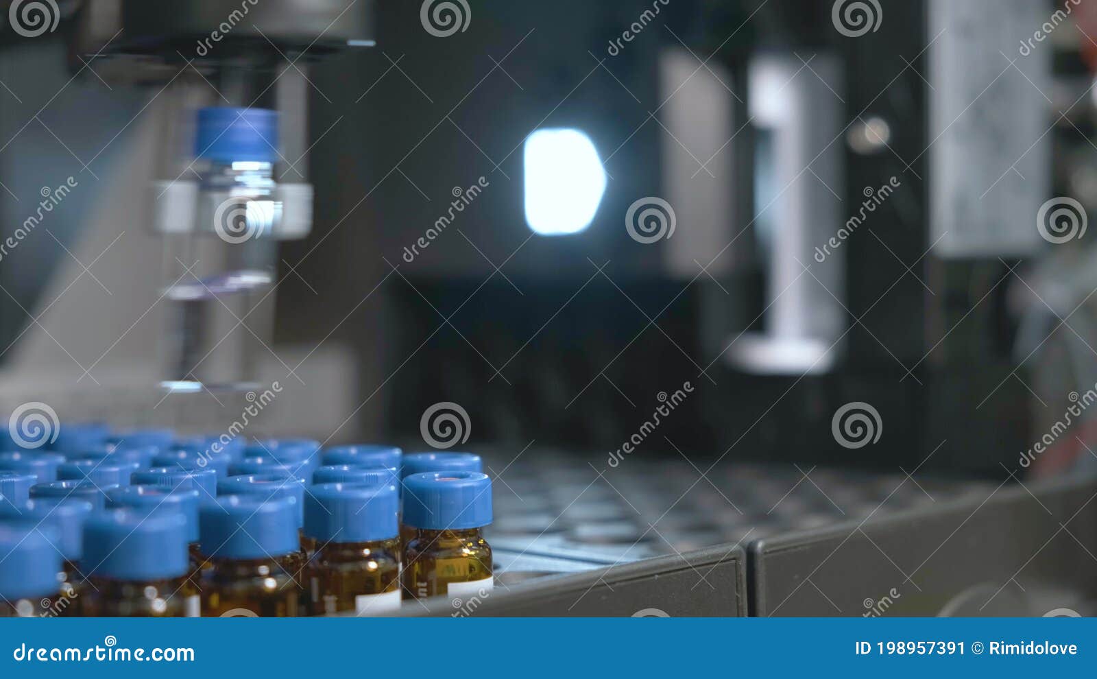 Auto Sampler Takes a Vial and Injects a Sample into High Performance ...