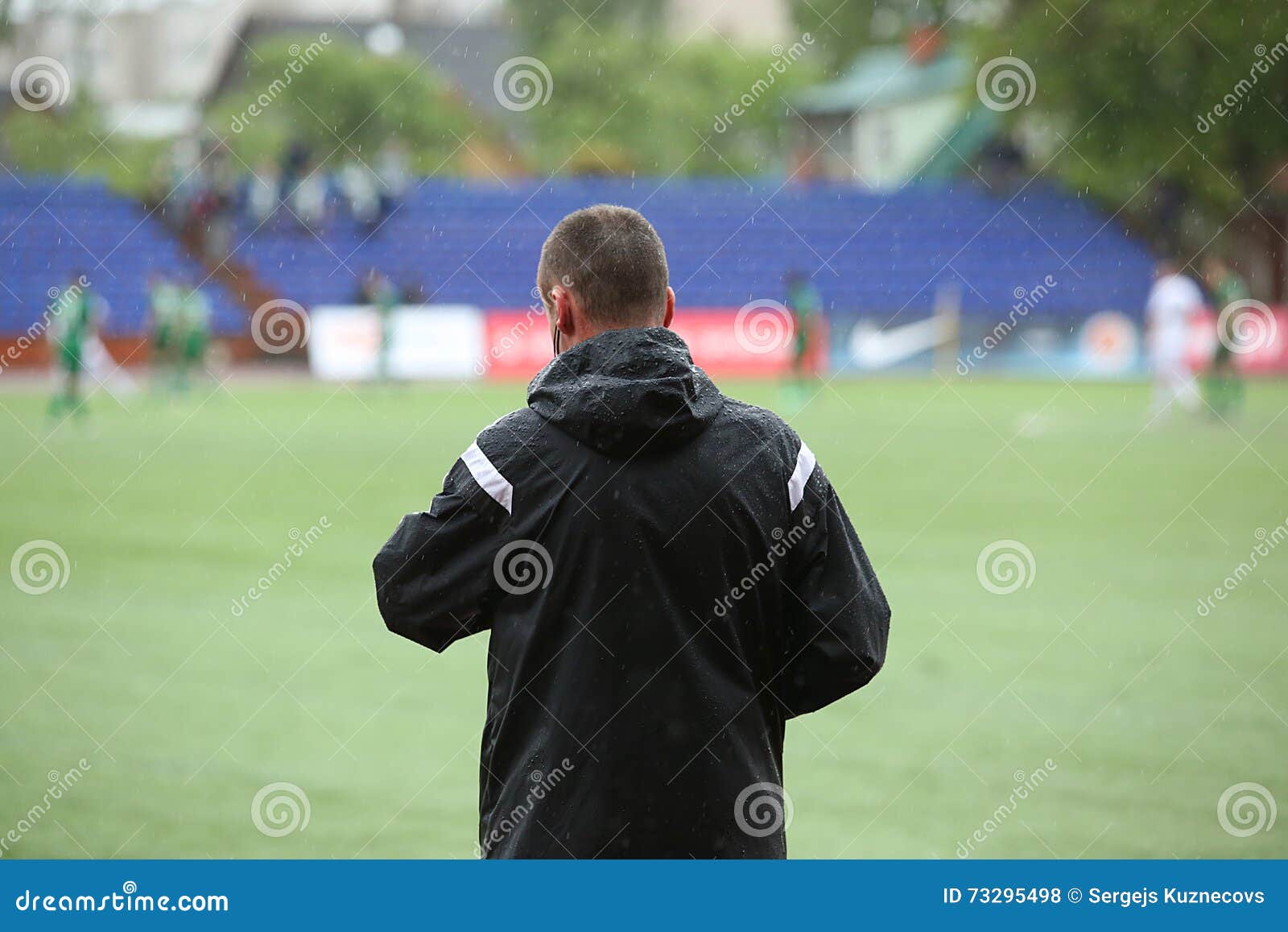 Footbal Coach Watching the Match Stock Photo - Image of rain, player ...