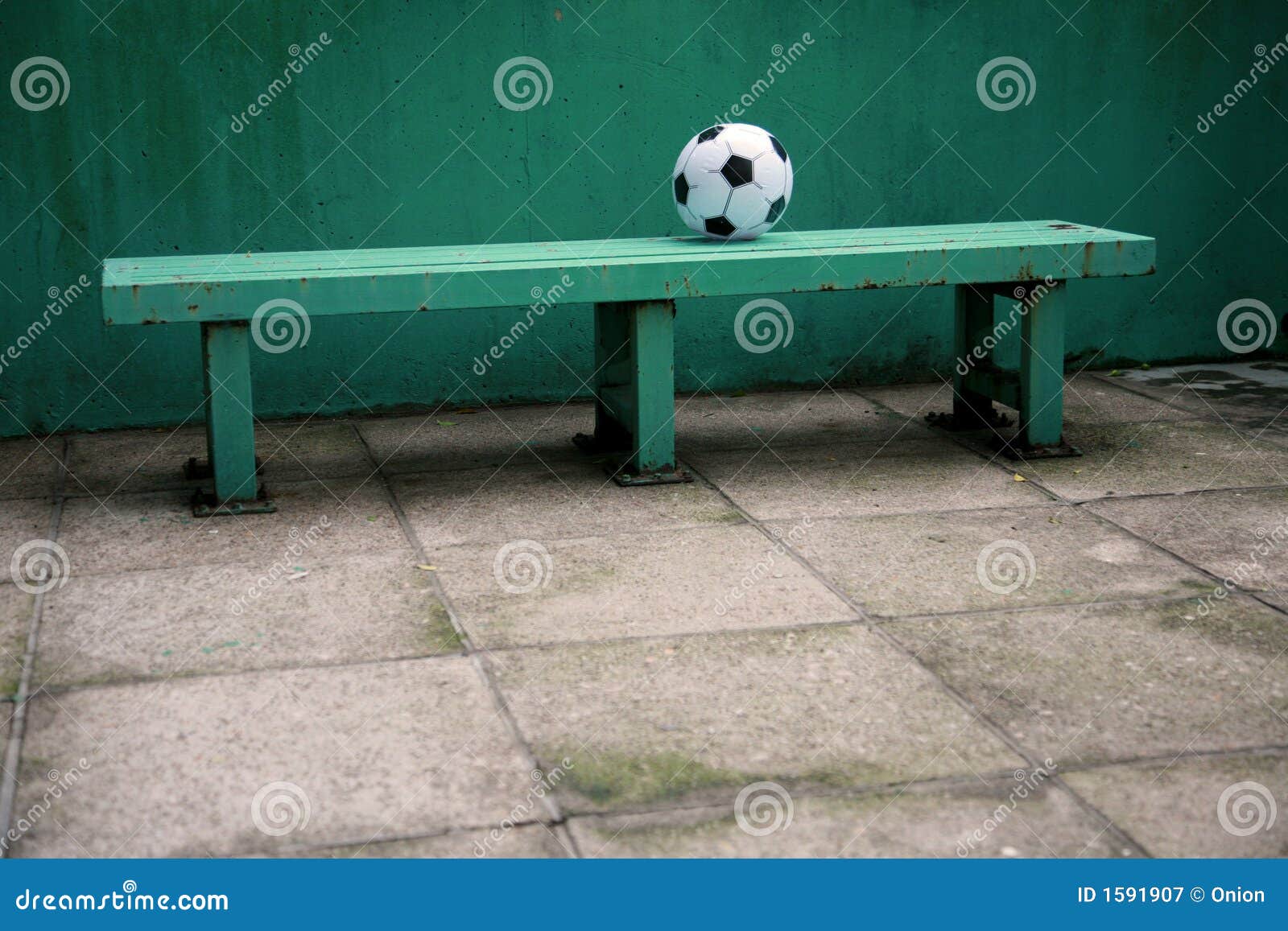 Football on bench stock image. Image of football, single - 1591907