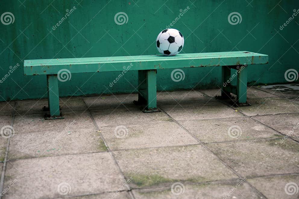Football on bench stock image. Image of football, single - 1591907