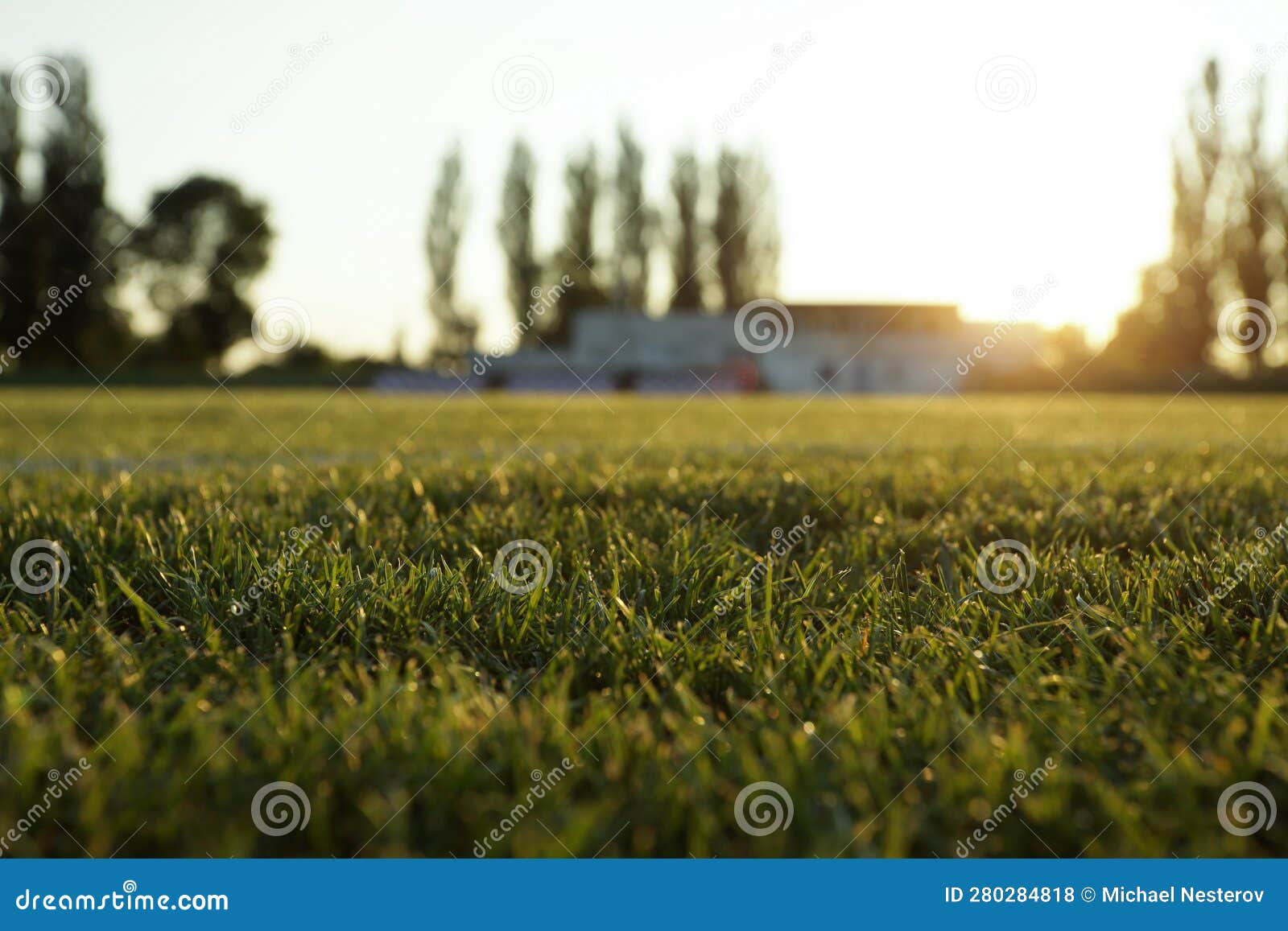 Football Field Stadium Lawn in the Rays of Sunset Stock Photo - Image ...