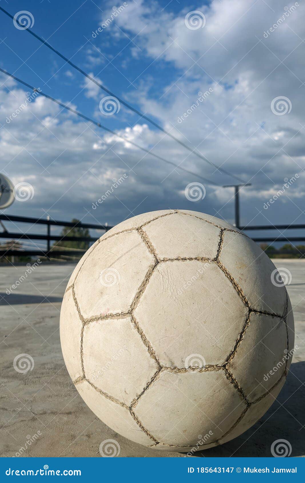 A football on the ground. stock image. Image of sculpture - 185643147