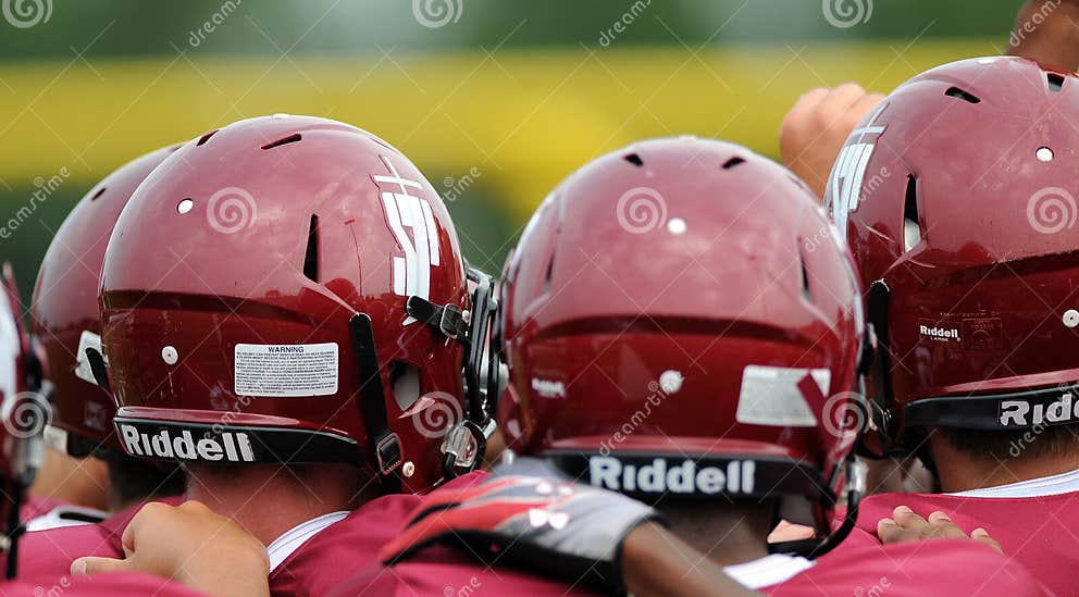 Football Huddle - Back of Helmets Editorial Stock Image - Image of ...