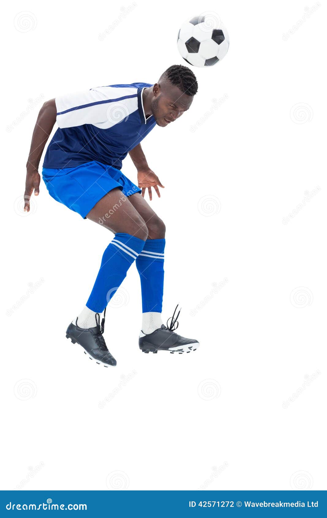 Football Player in Blue Heading Ball Stock Photo - Image of person ...