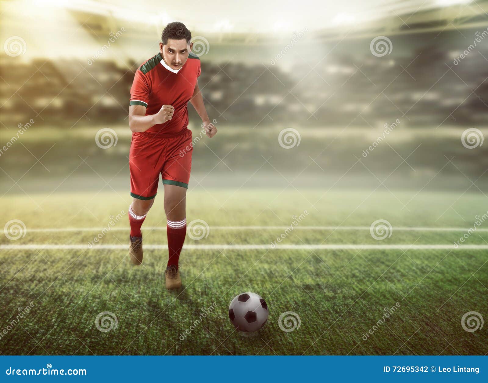 Football Player Dribbling Ball Stock Photo - Image of head, people ...