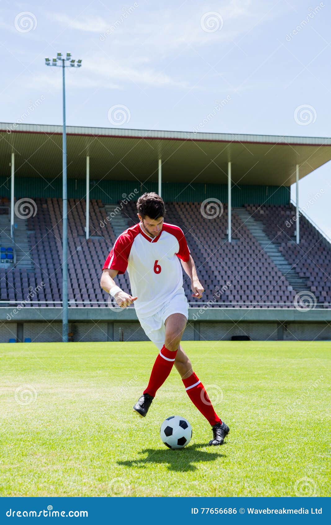 Football Player Practicing Soccer Stock Photo - Image of focused, field ...