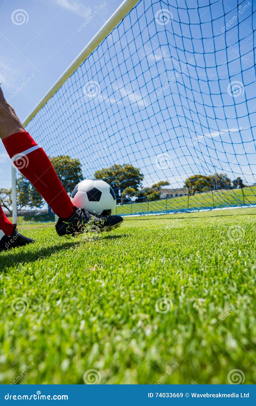 Football Player Scoring a Goal Stock Image - Image of male, adult: 74033669