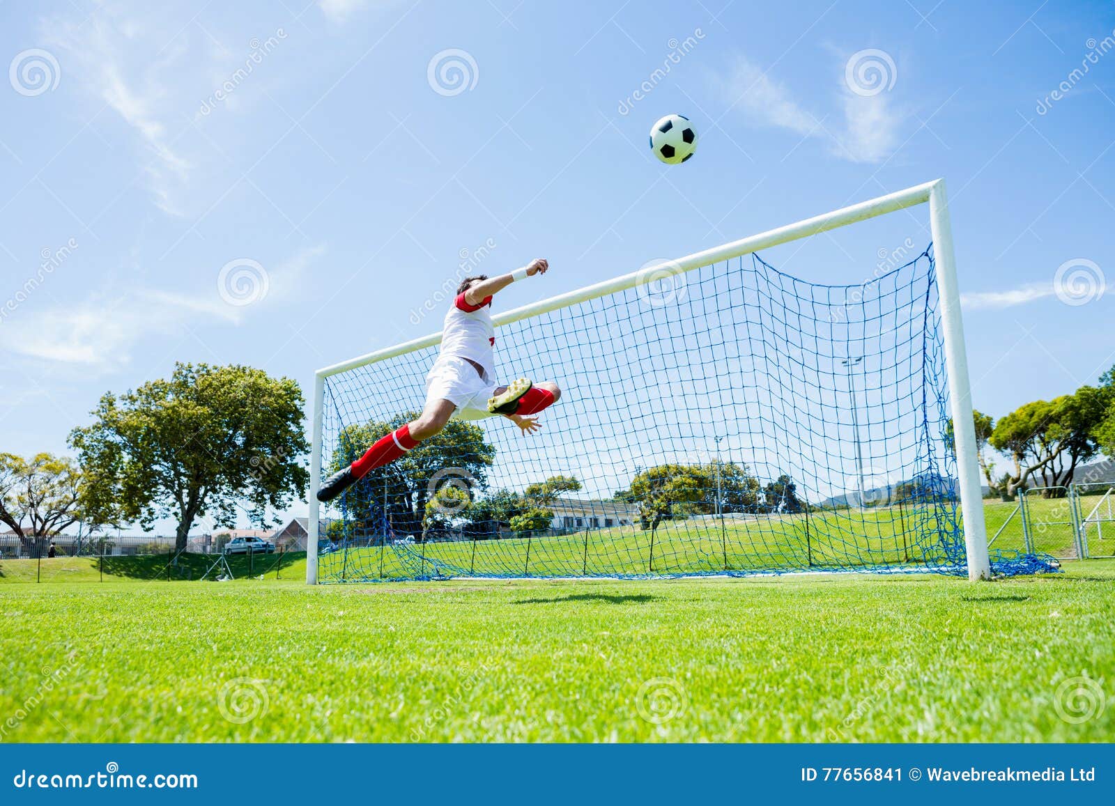 Football Player Scoring a Goal Stock Image - Image of determination ...
