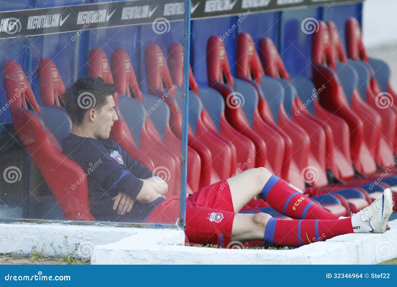 Football Player Sitting on the Bench Editorial Stock Image - Image of ... Football Player Sitting on the Bench Editorial Stock Image - Image of ...