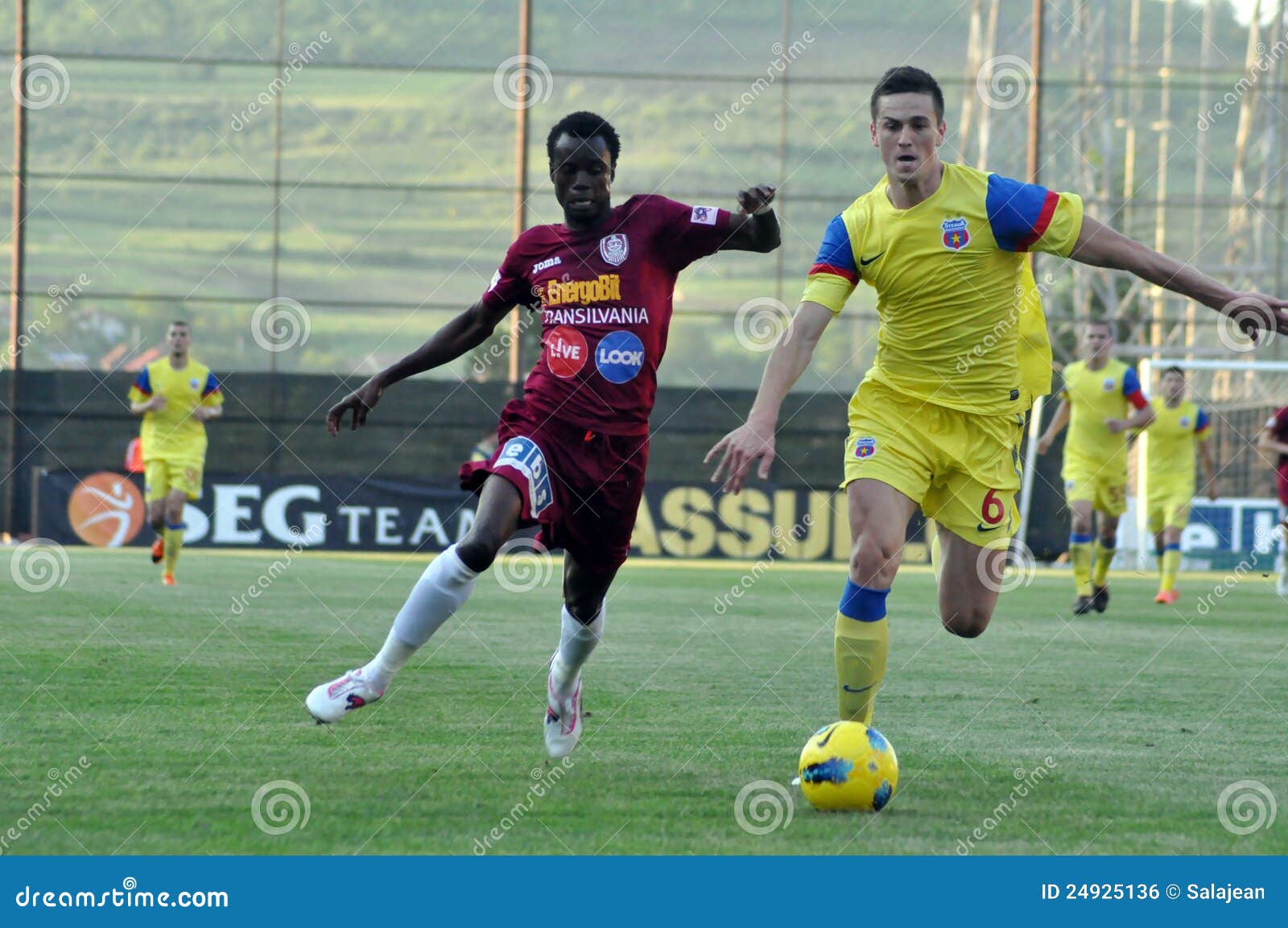 Football players running editorial photo. Image of offense - 24925136