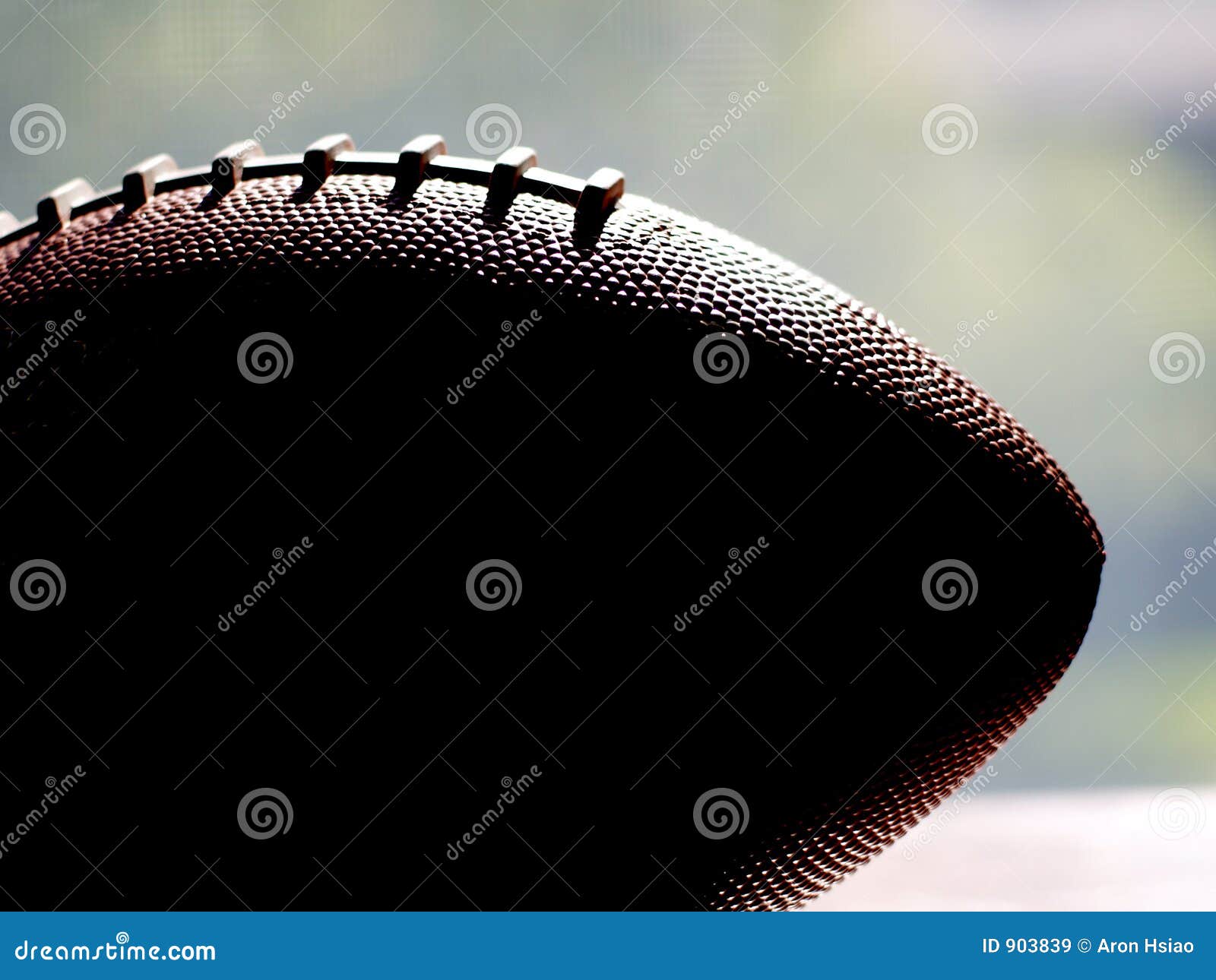 Football in Silhouette Against Window Stock Image - Image of victors ...
