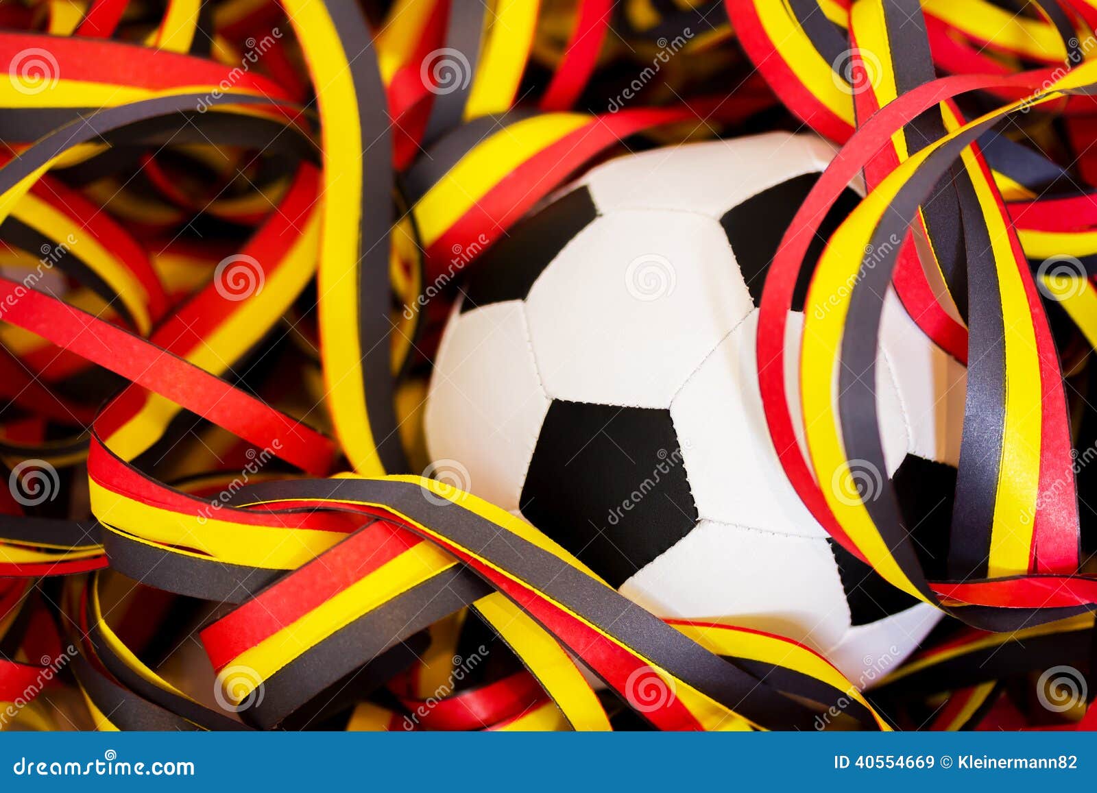 Football and streamers stock image. Image of paper, yellow - 40554669