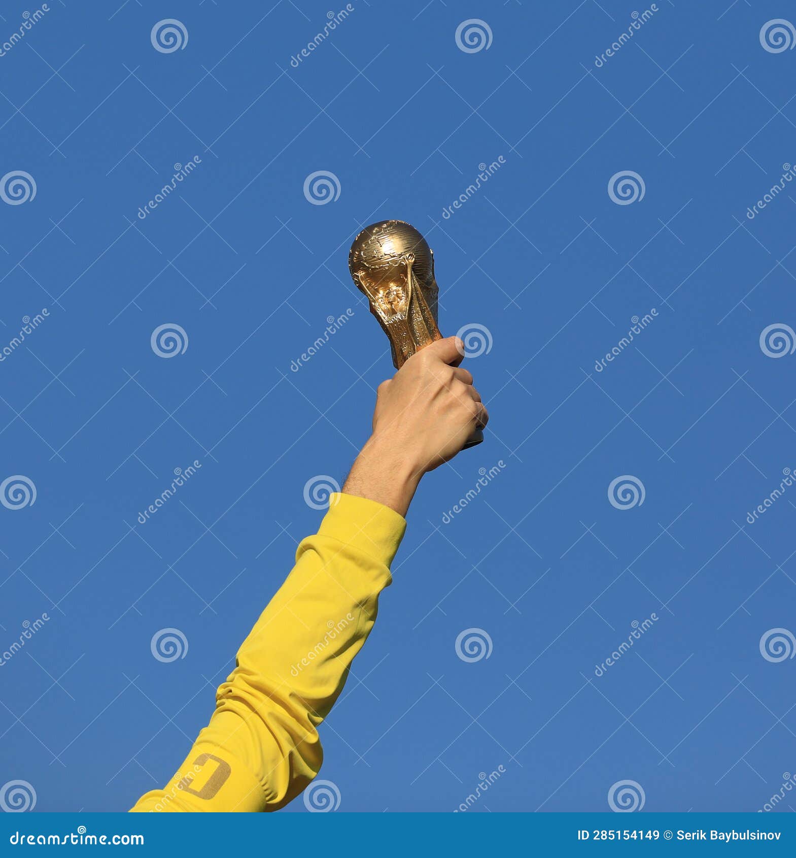 Football world cup in hand editorial stock image. Image of game - 285154149