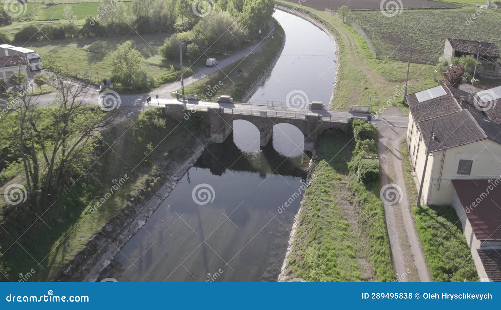 Footbridge Across the River , between Fields and Tree Planting in the ...
