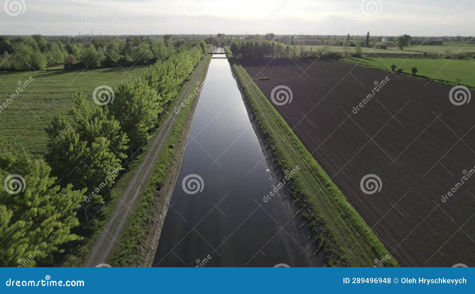 Footbridge Across the River , between Fields and Tree Planting in the ...