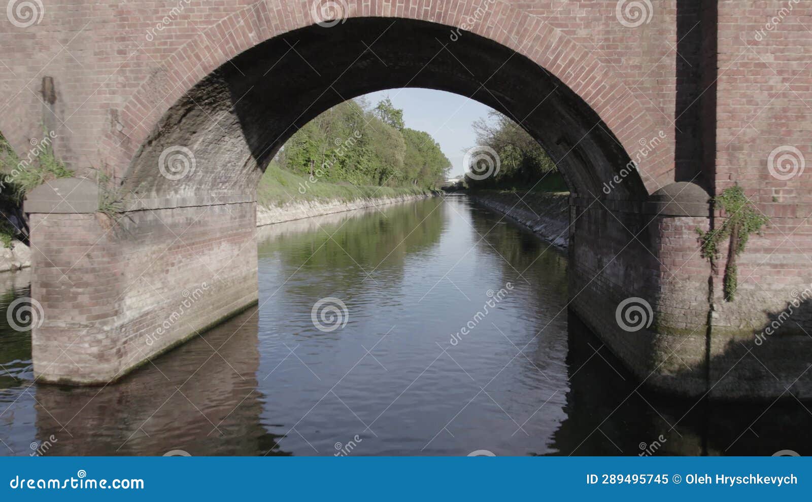 Footbridge Across the River , between Fields and Tree Planting in the ...