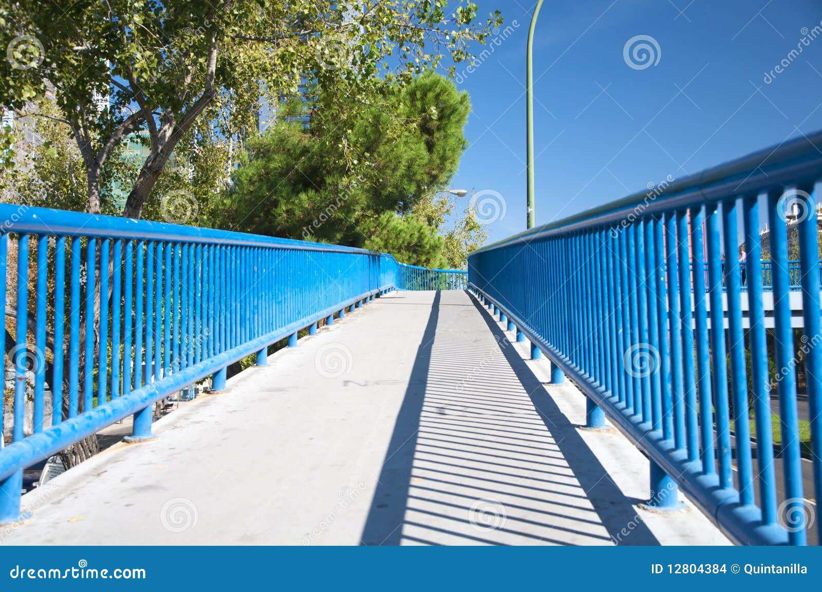Footbridge with Blue Railing Stock Photo - Image of corridor, bridge ...