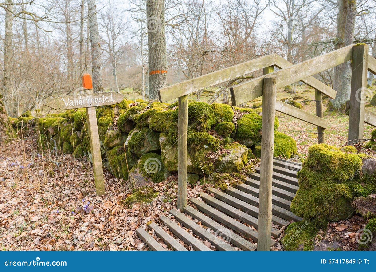Footbridge Over the Stone Wall Stock Image - Image of arrow, hike: 67417849