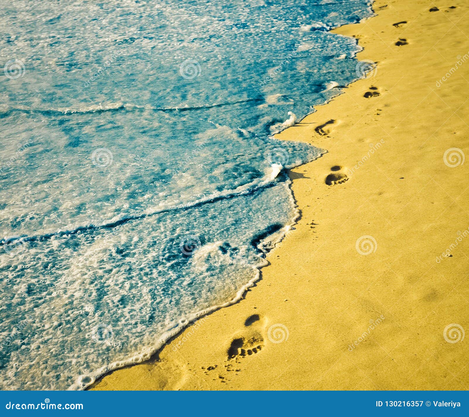Footprint on sand stock image. Image of barefoot, tropical - 130216357