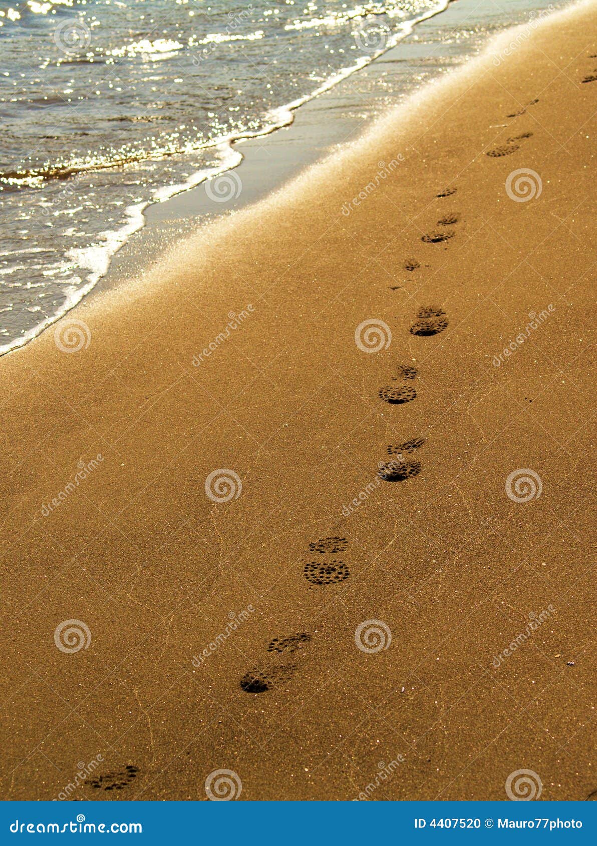 Footprints on the beach stock photo. Image of active, nature - 4407520