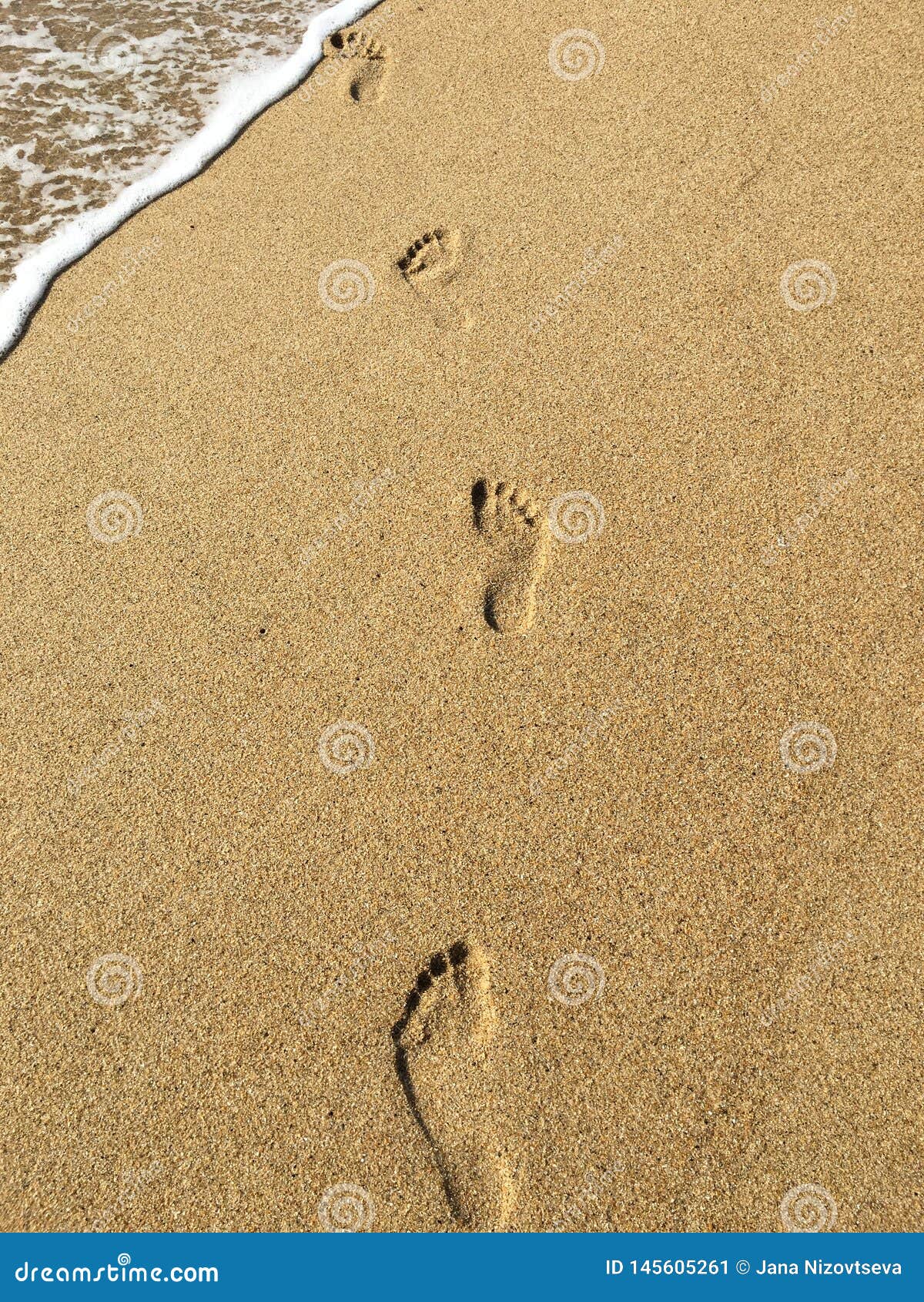 Footprints on the Golden Sand. Stock Image - Image of seashore, foot ...