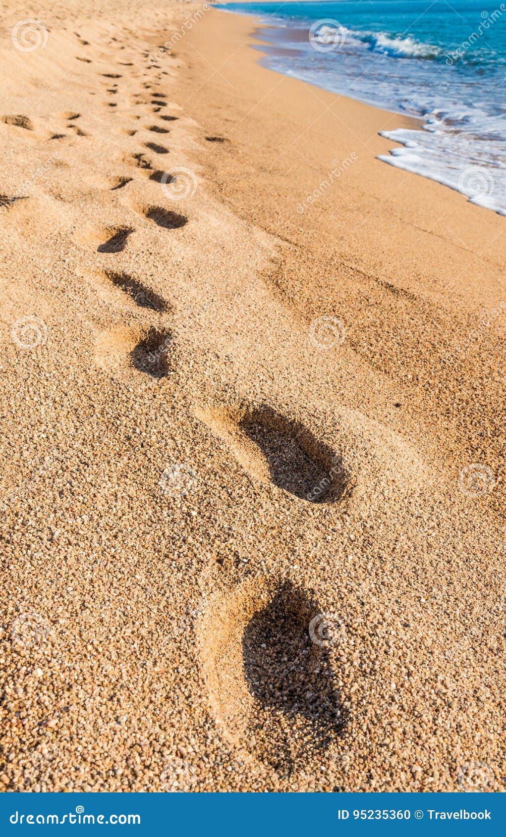 Footprints on sand beach. stock photo. Image of concept - 95235360