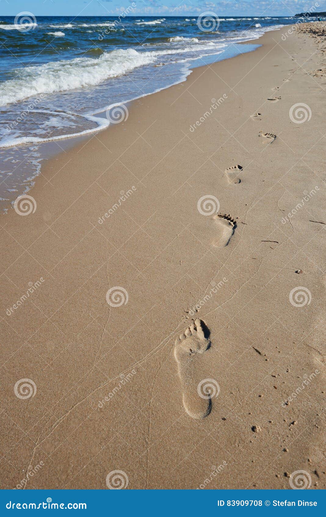 Footprints in sand stock photo. Image of nature, dune - 83909708