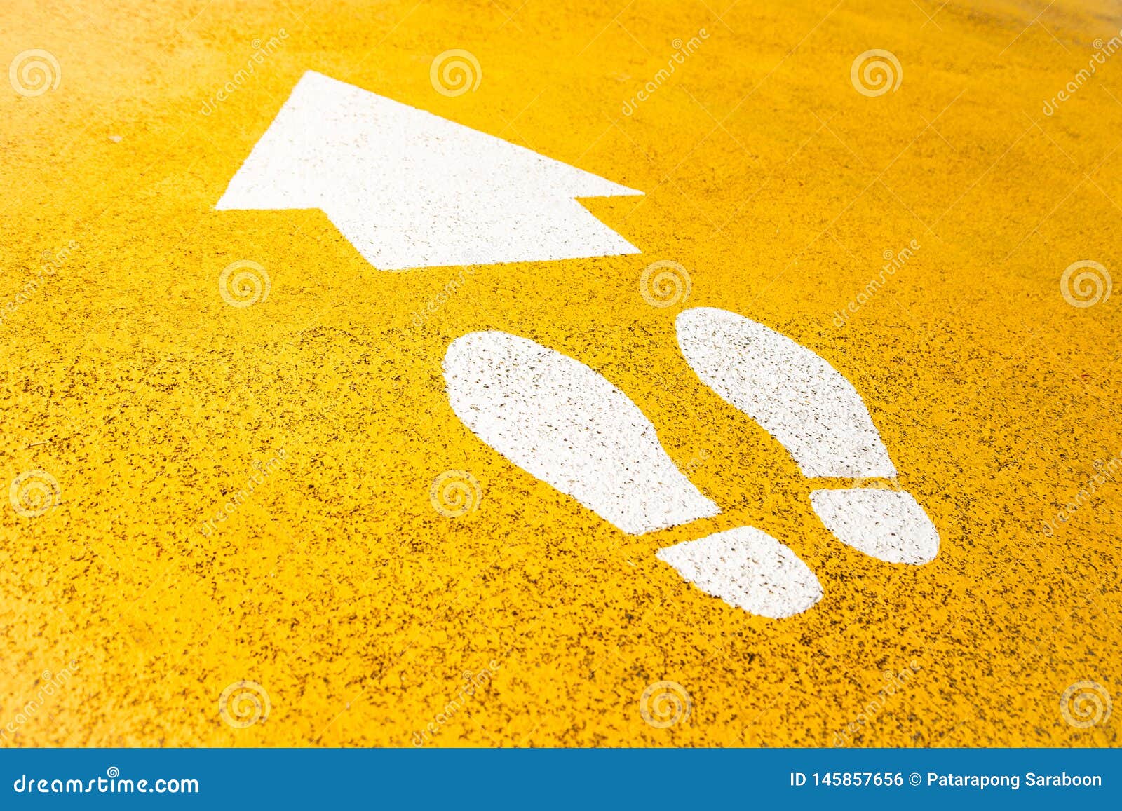 Footprints Signs on Yellow Asphalt Road Colour Stock Photo - Image of ...