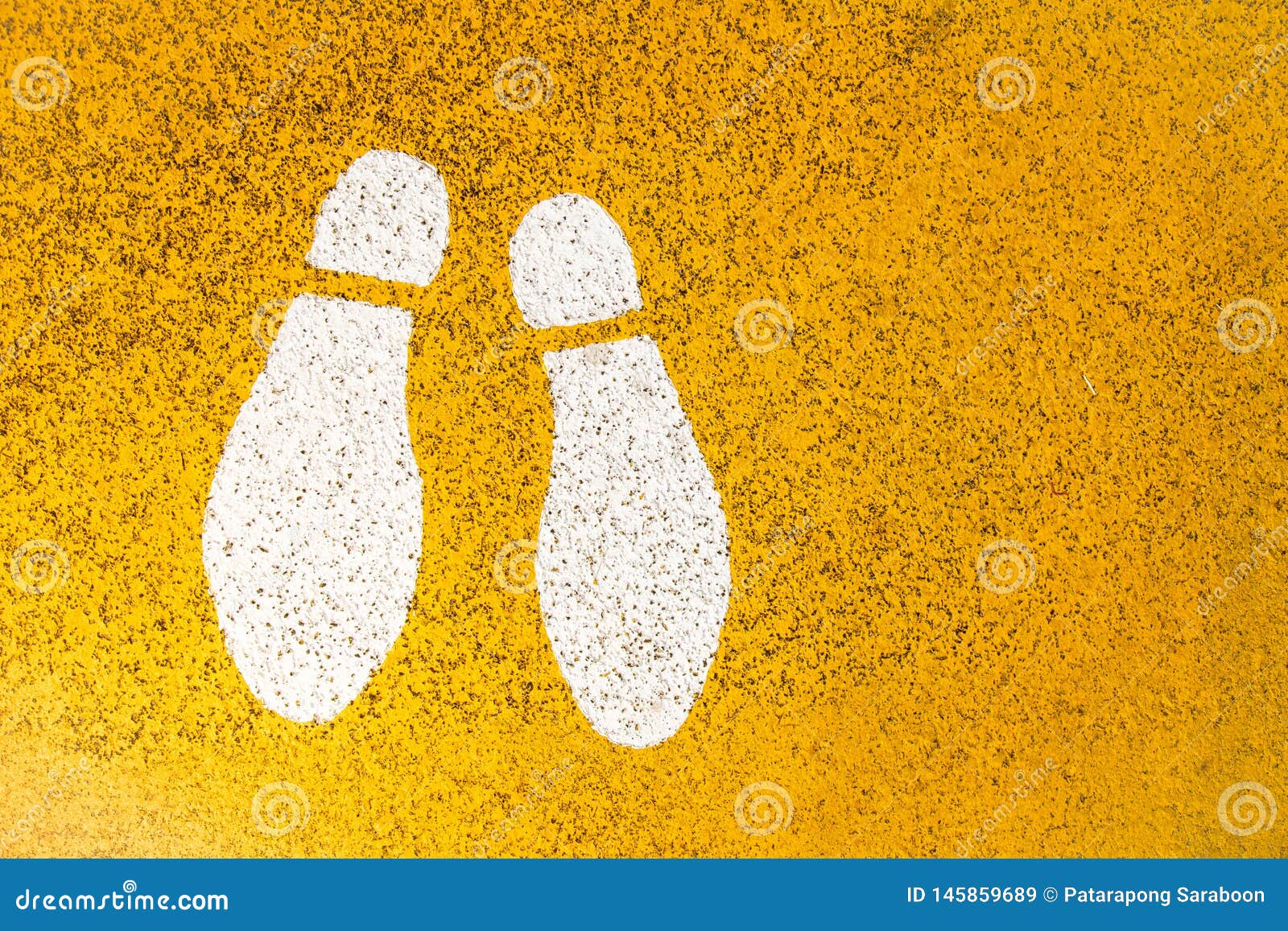 Footprints Signs on Yellow Asphalt Road Colour Stock Image - Image of ...