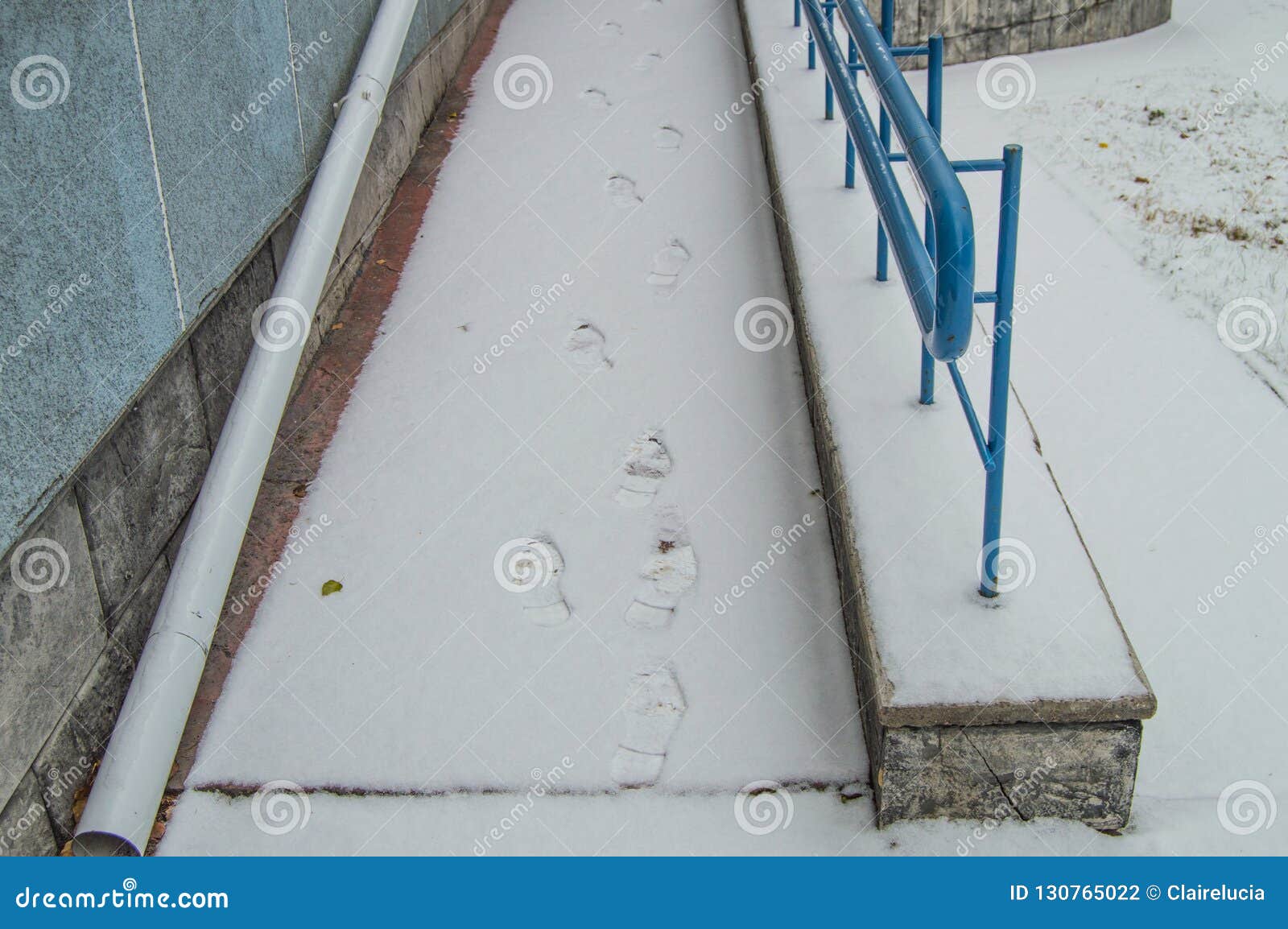 Footprints in the Snow on the Ramp Installed for the Movement of People ...