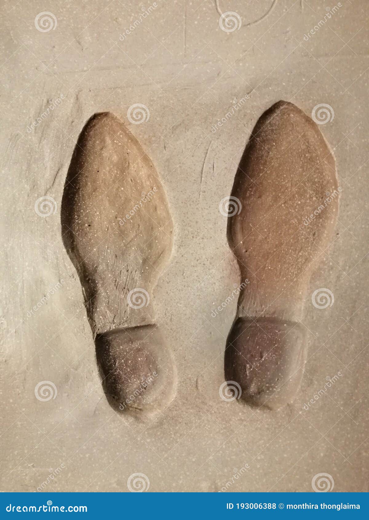 Footprints on the wall stock photo. Image of stone, footprints - 193006388