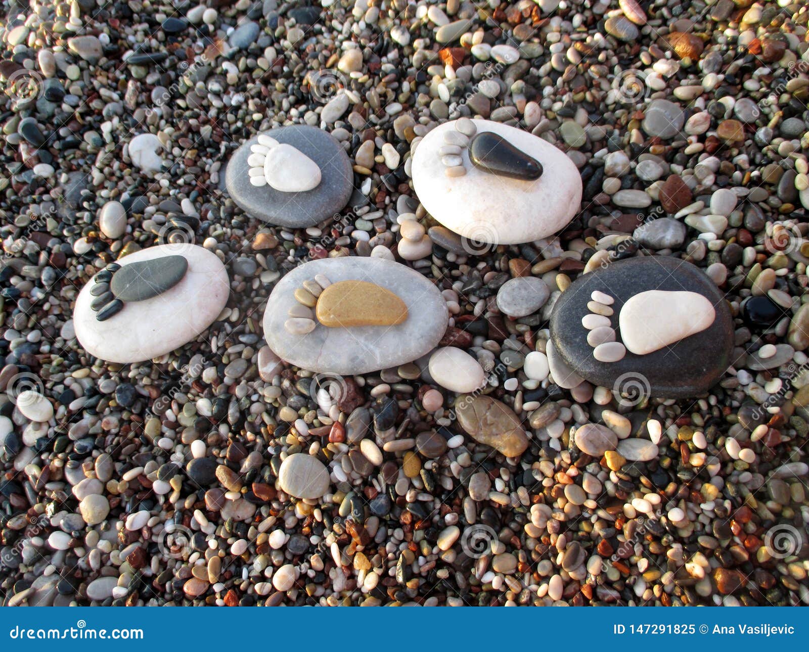 Footsteps stones stock image. Image of coast, pebble - 147291825