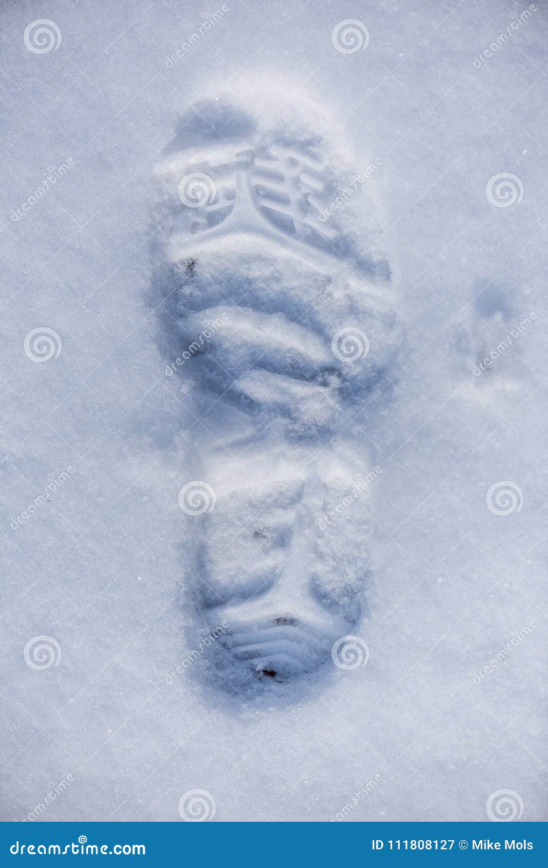 Footstep in the snow stock image. Image of snow, close - 111808127