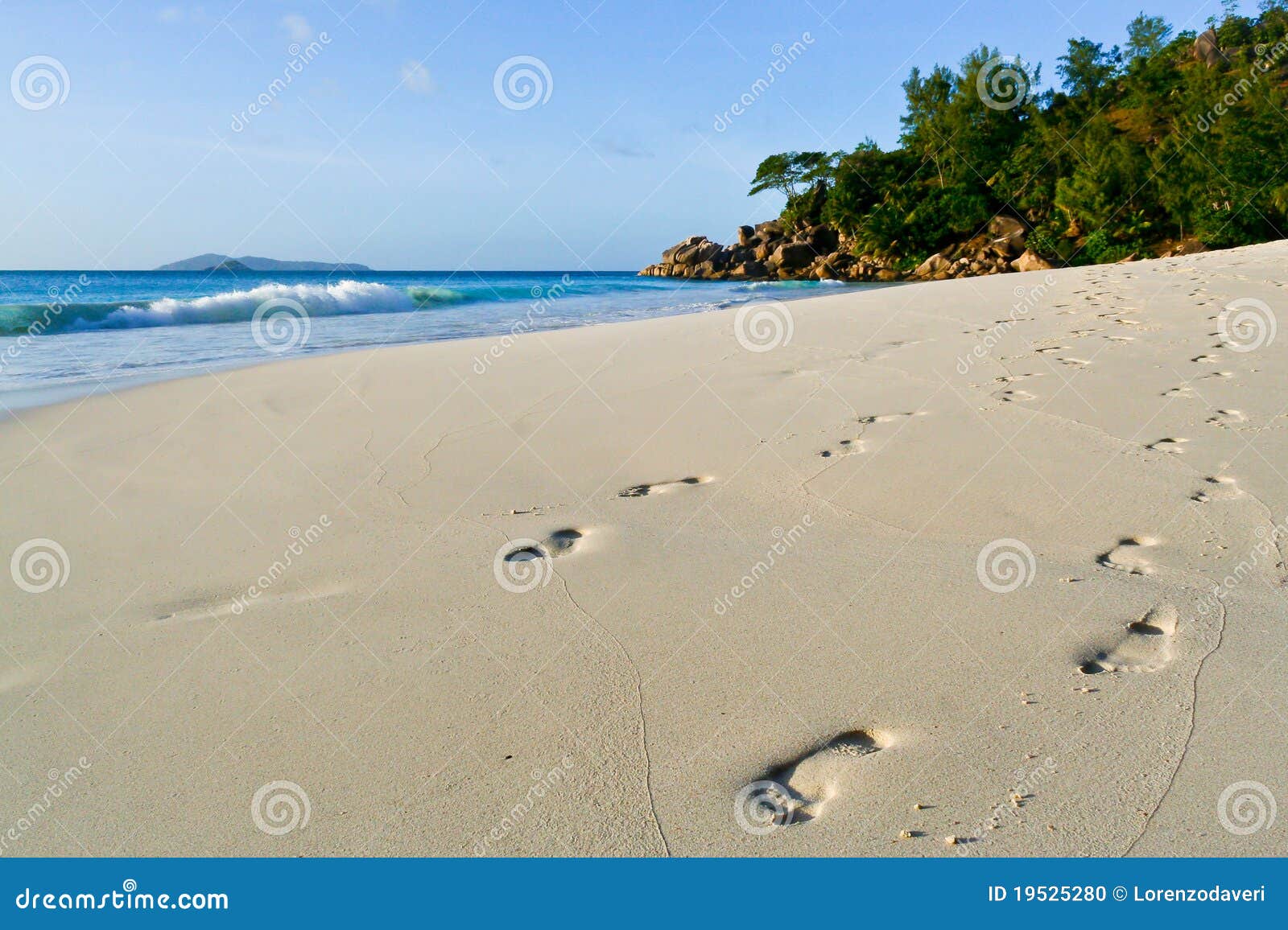 Footsteps on the beach stock photo. Image of peace, traces - 19525280