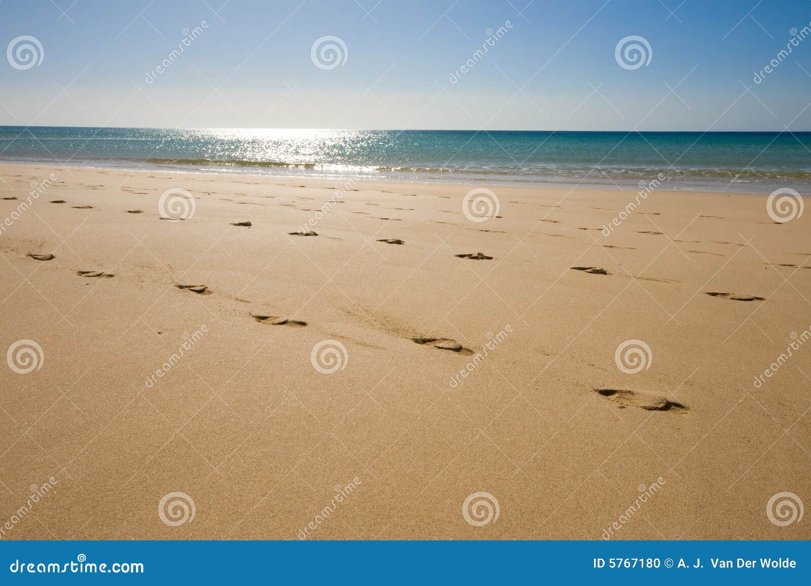 Footsteps on the beach stock photo. Image of explorer - 5767180
