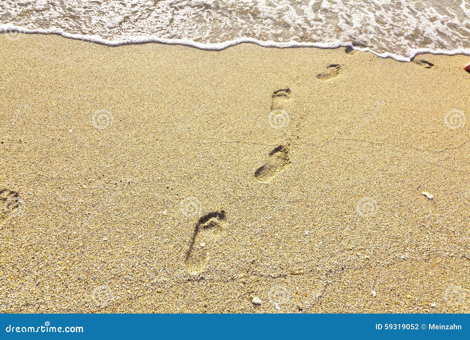 Footsteps at the beach stock photo. Image of america - 59319052