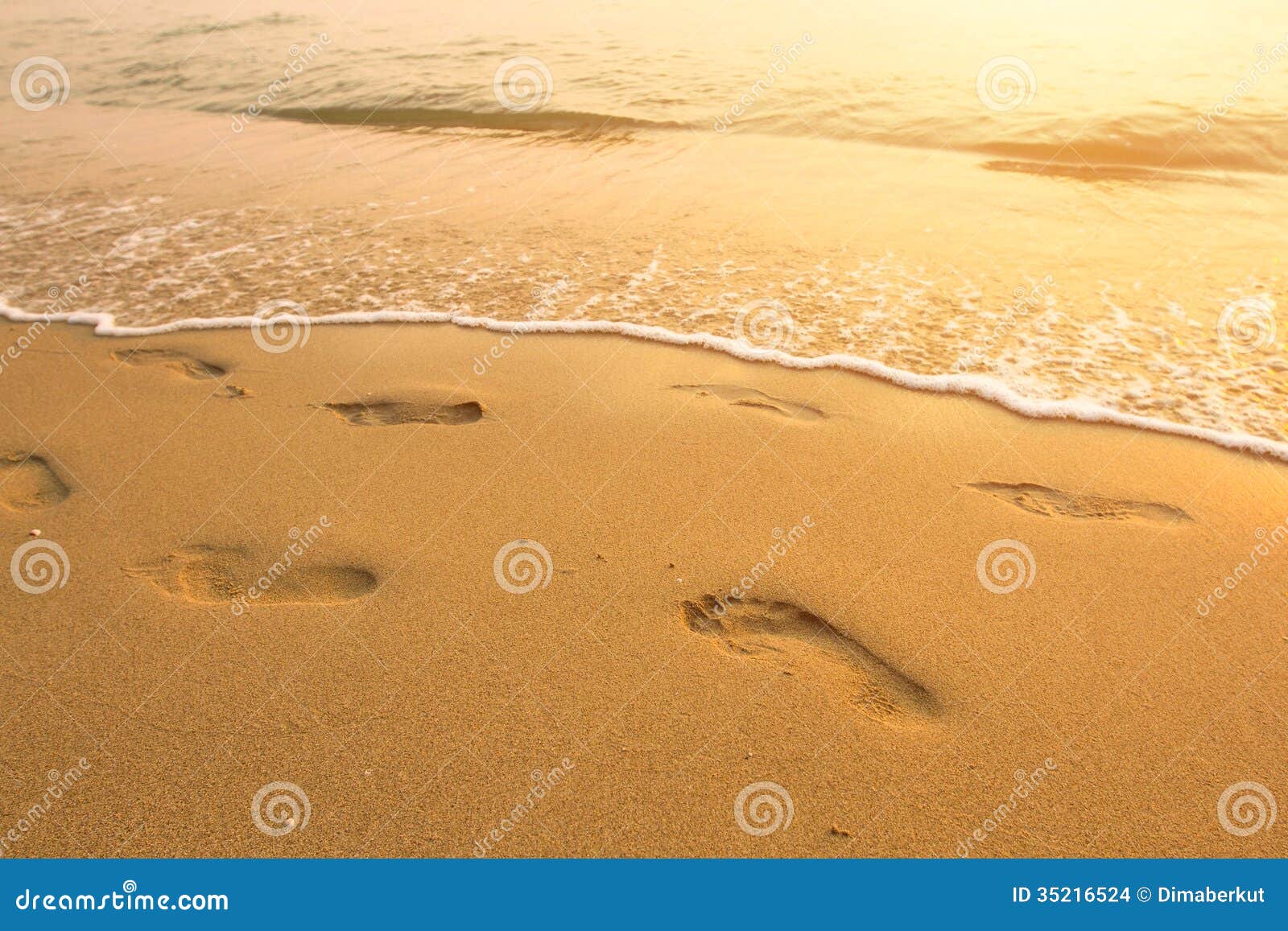 Footsteps on the Beach by the Sea Stock Photo - Image of coastline ...