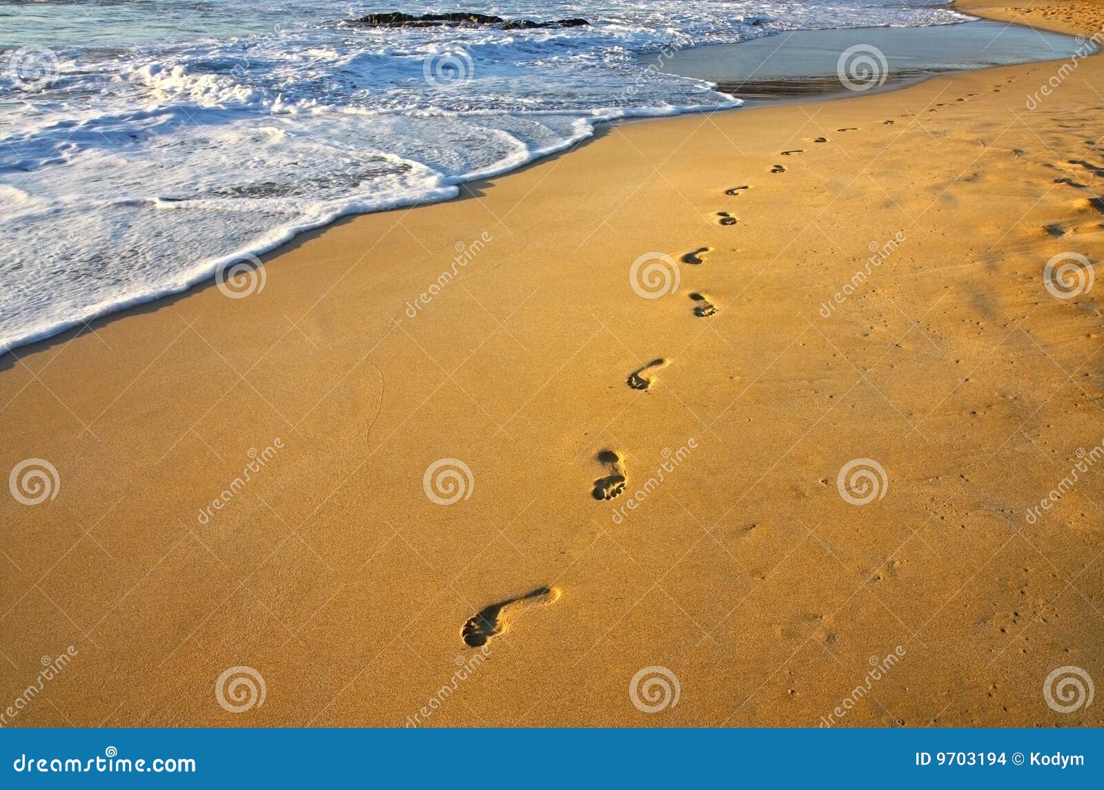 Footsteps on the Beach and Water Stock Photo - Image of journey ...