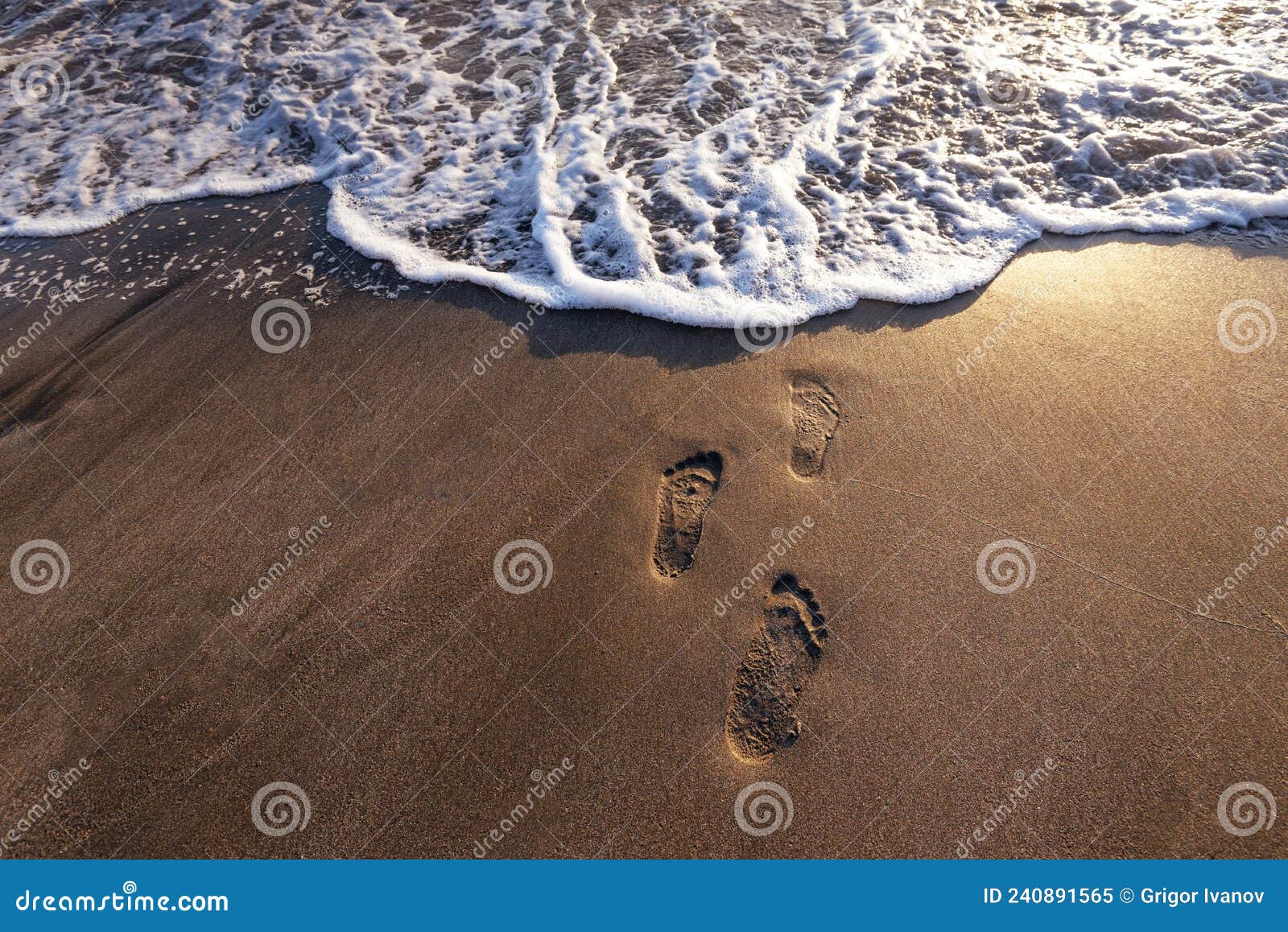 Footsteps on the beach stock image. Image of morning - 240891565