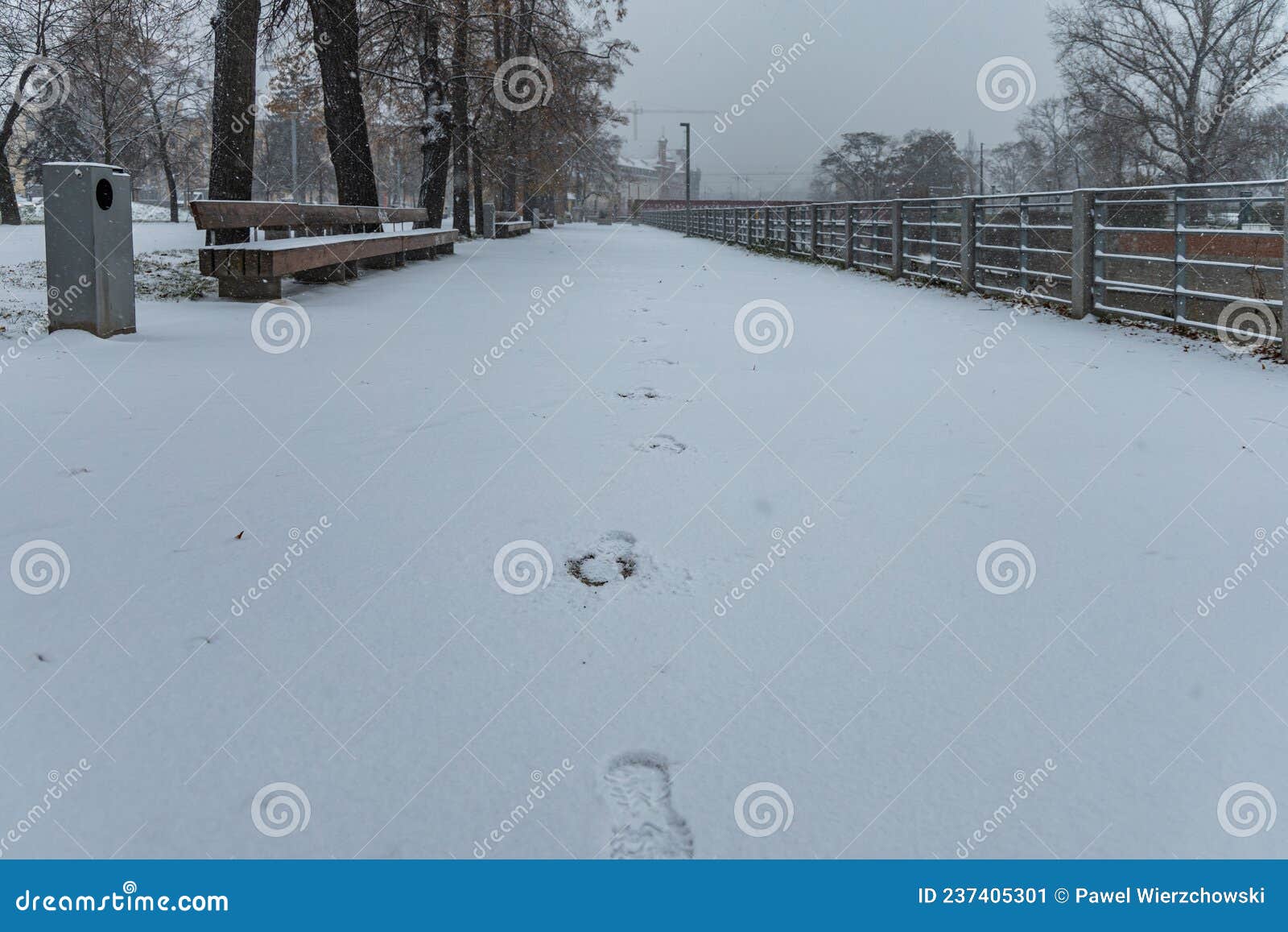 Footsteps Imprinted on the Snow at Pathway Next To River Stock Image ...