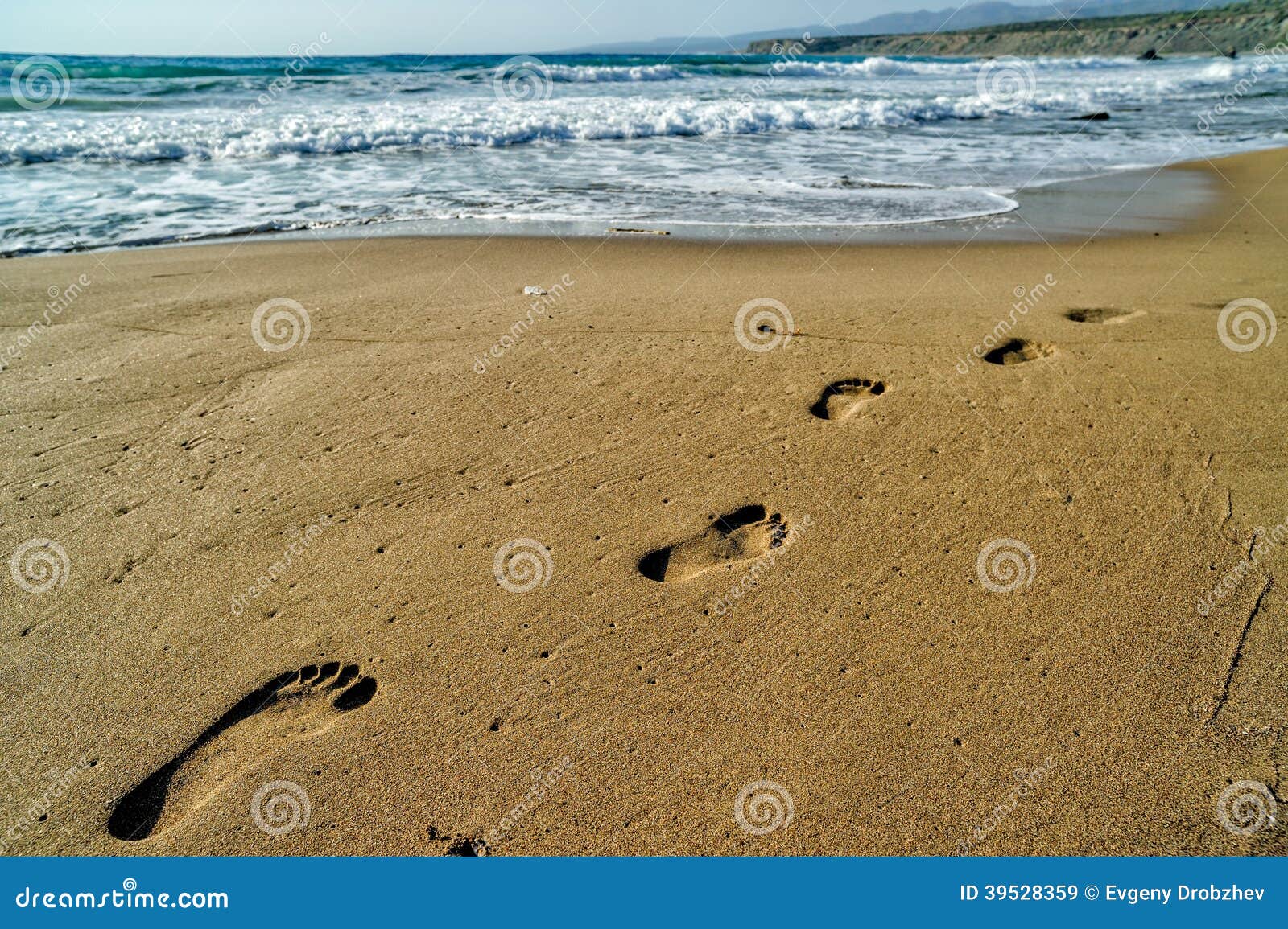 Footsteps on the sand stock image. Image of scene, sand - 39528359