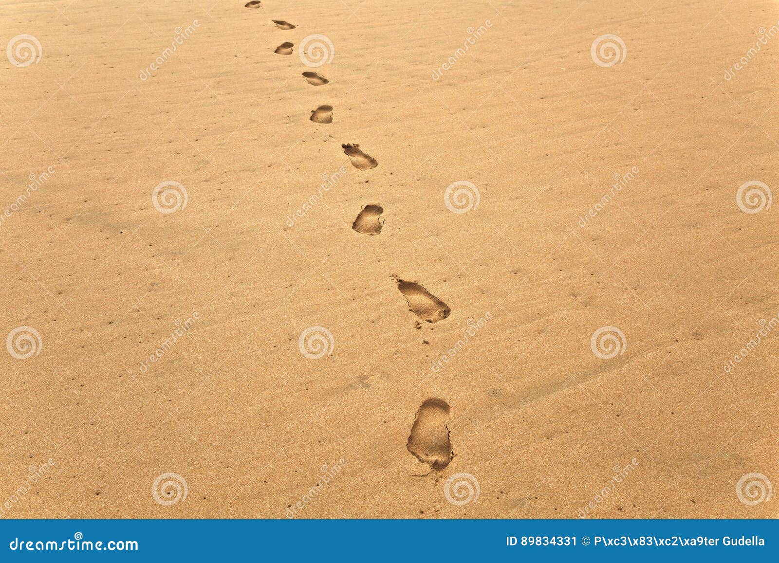 Footsteps in Sand stock image. Image of idyllic, light - 89834331